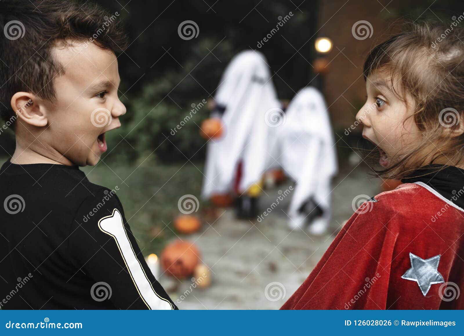 Scared Little Girl Sitting On Floor At Creepy Dark Night Royalty-Free ...