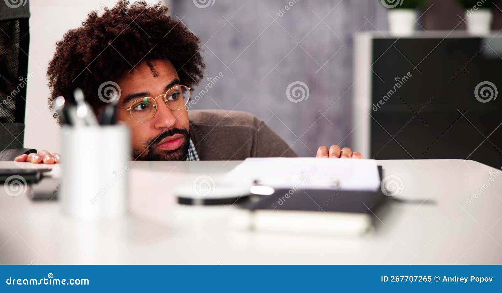 Scared Man Hiding Behind Office Desk Stock Image - Image of business ...