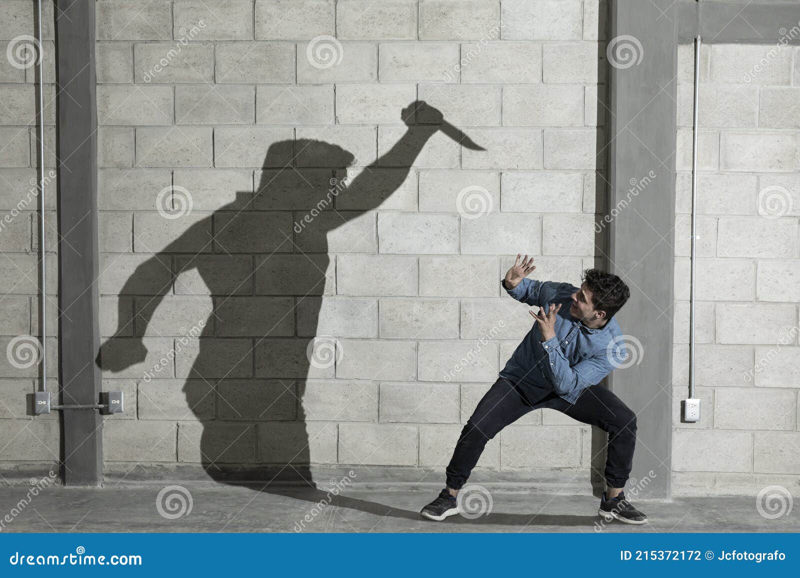 Scared Man by His Own Shadow Stock Photo - Image of evil, indoor: 215372172