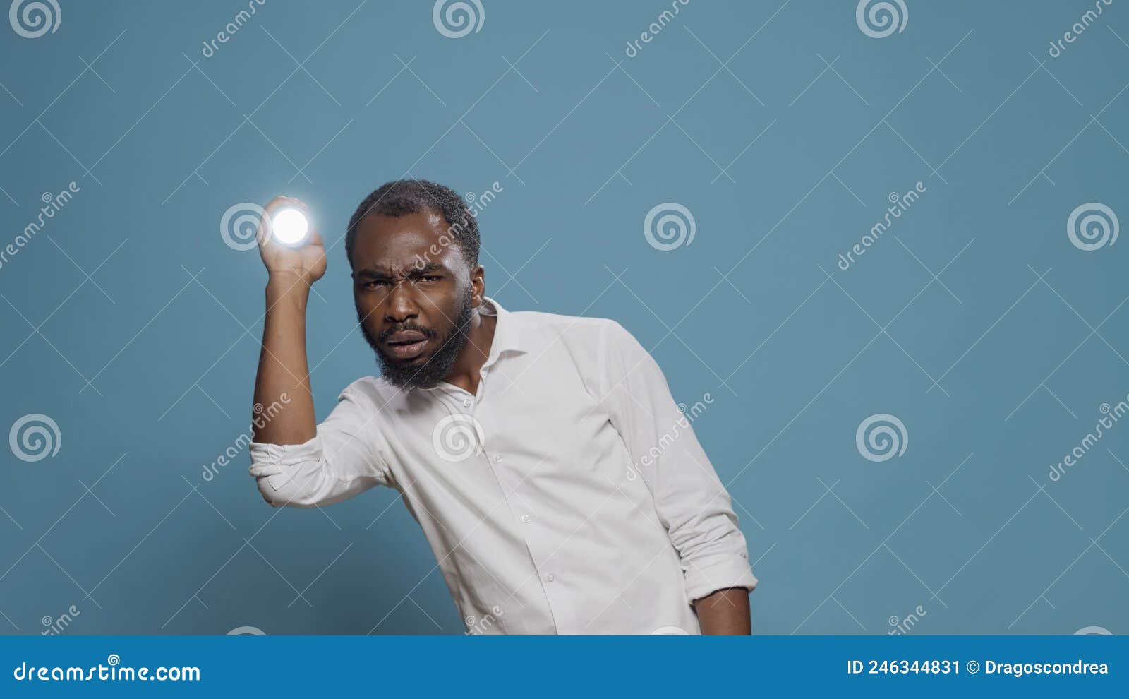 Scared Man Using Lantern To Make Light and Look Around Stock Image ...
