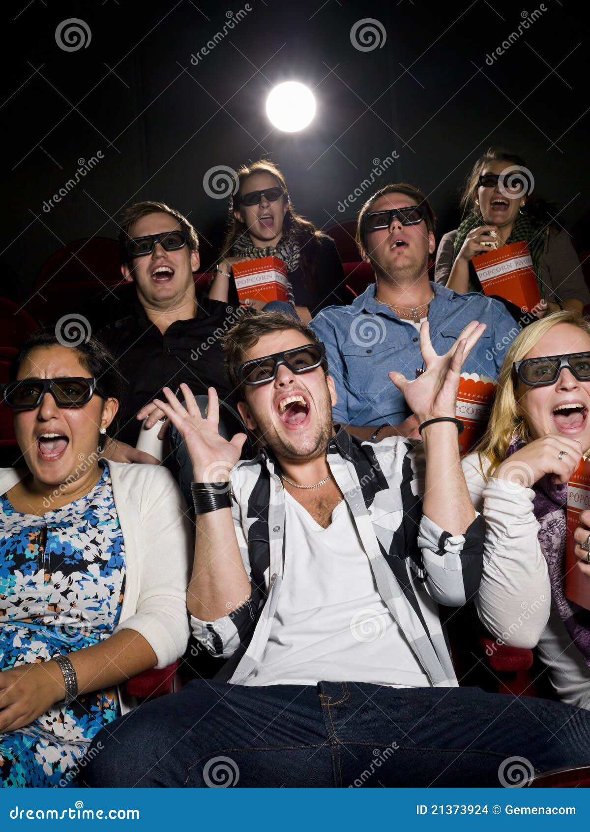 Scared movie spectators stock photo. Image of medium - 21373924