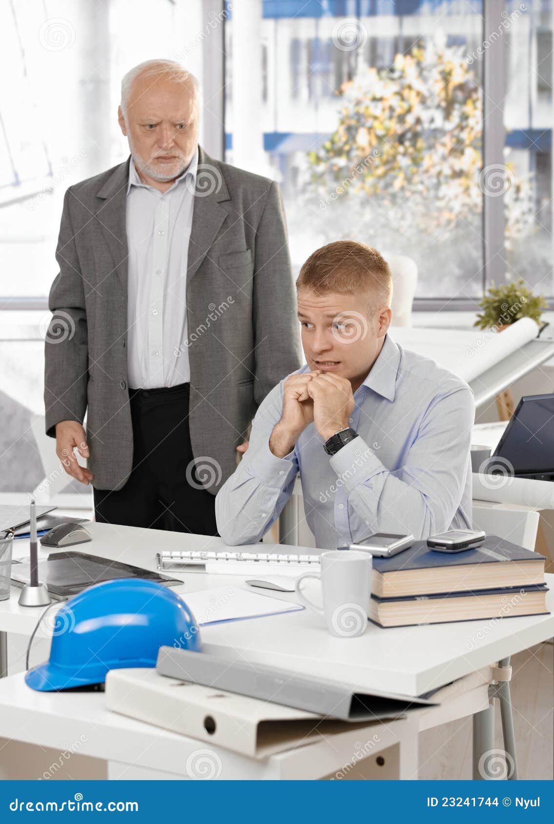 Scared Office Worker with Angry Executive Stock Photo - Image of casual ...