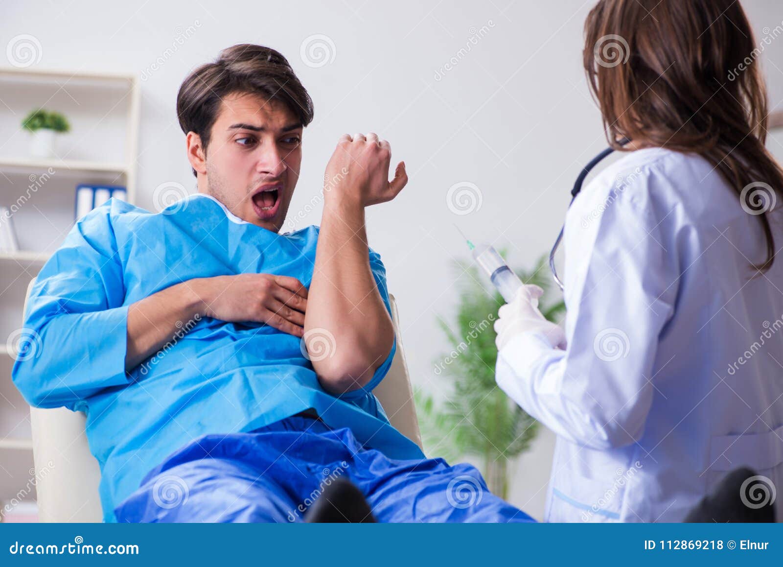 The Scared Patient Man Getting Ready for Flu Shot Stock Photo - Image ...