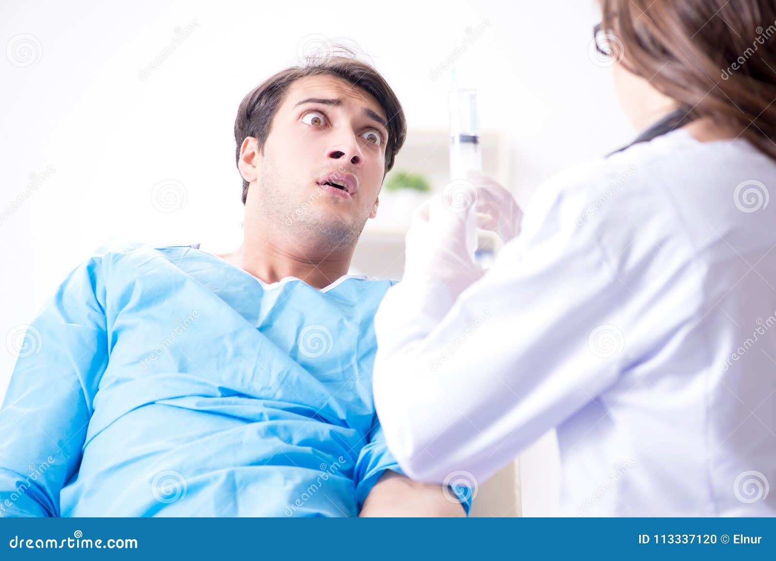 The Scared Patient Man Getting Ready for Flu Shot Stock Photo - Image ...