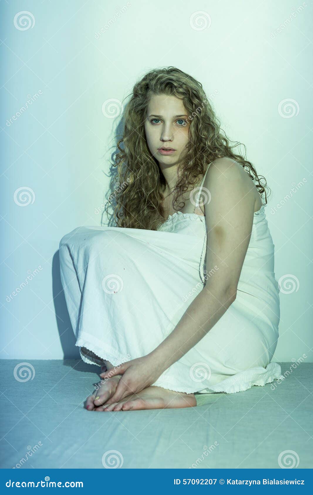 Scared victim stock image. Image of curled, floor, girl - 57092207
