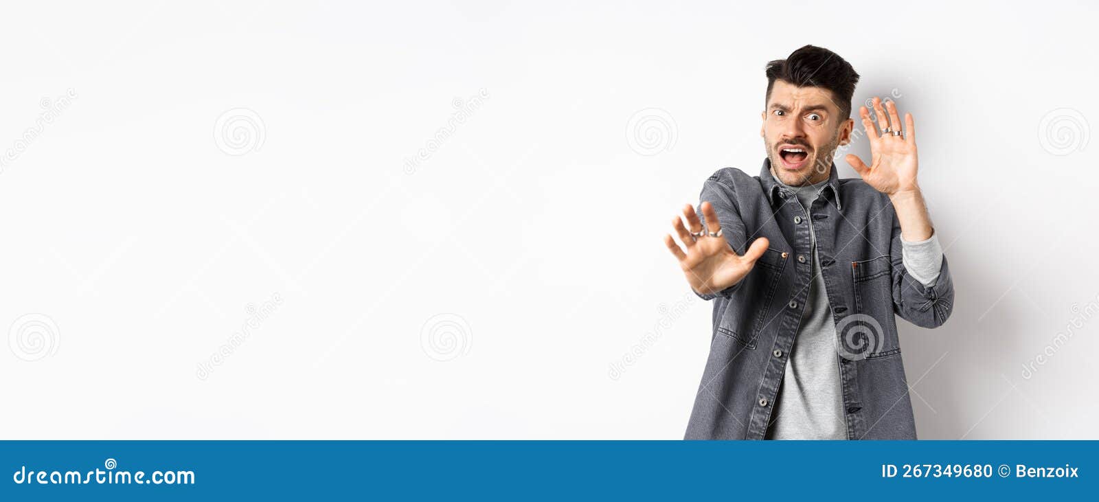 Scared Timid Guy Screaming and Raising Hands in Pleading Pose, Begging ...