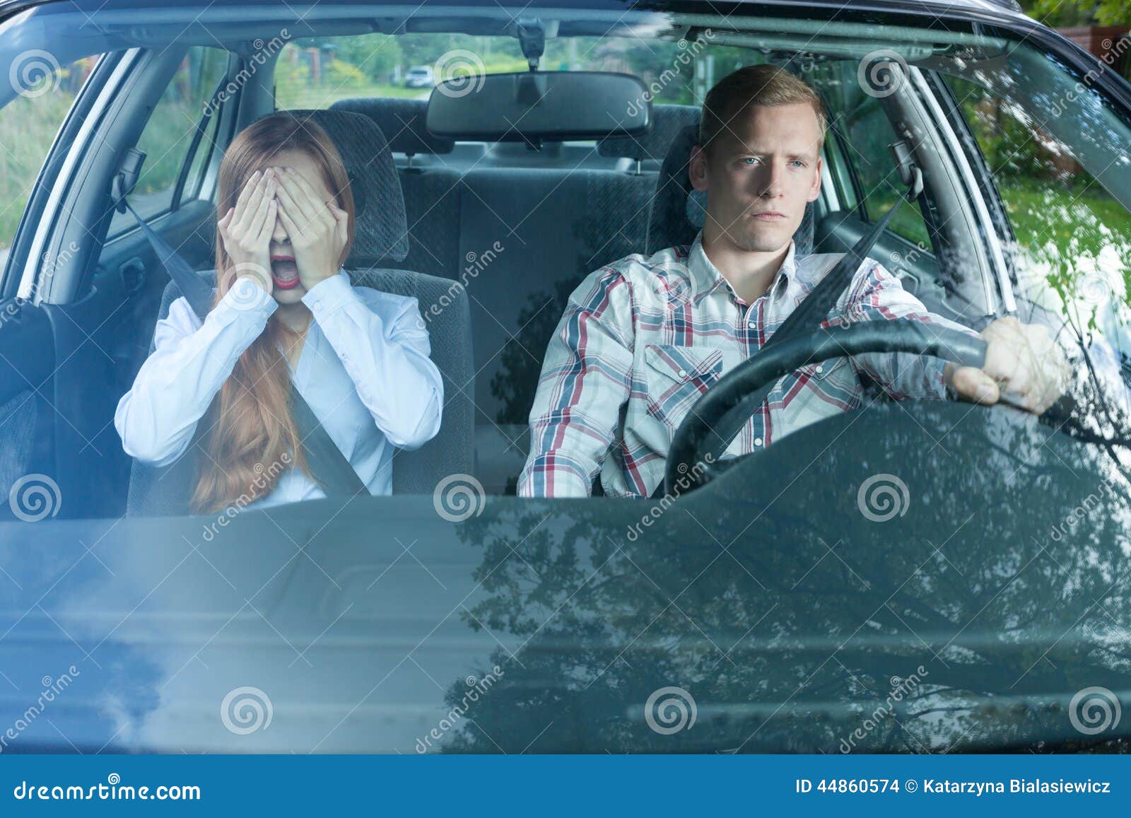 Scared woman in a car stock photo. Image of relationship - 44860574
