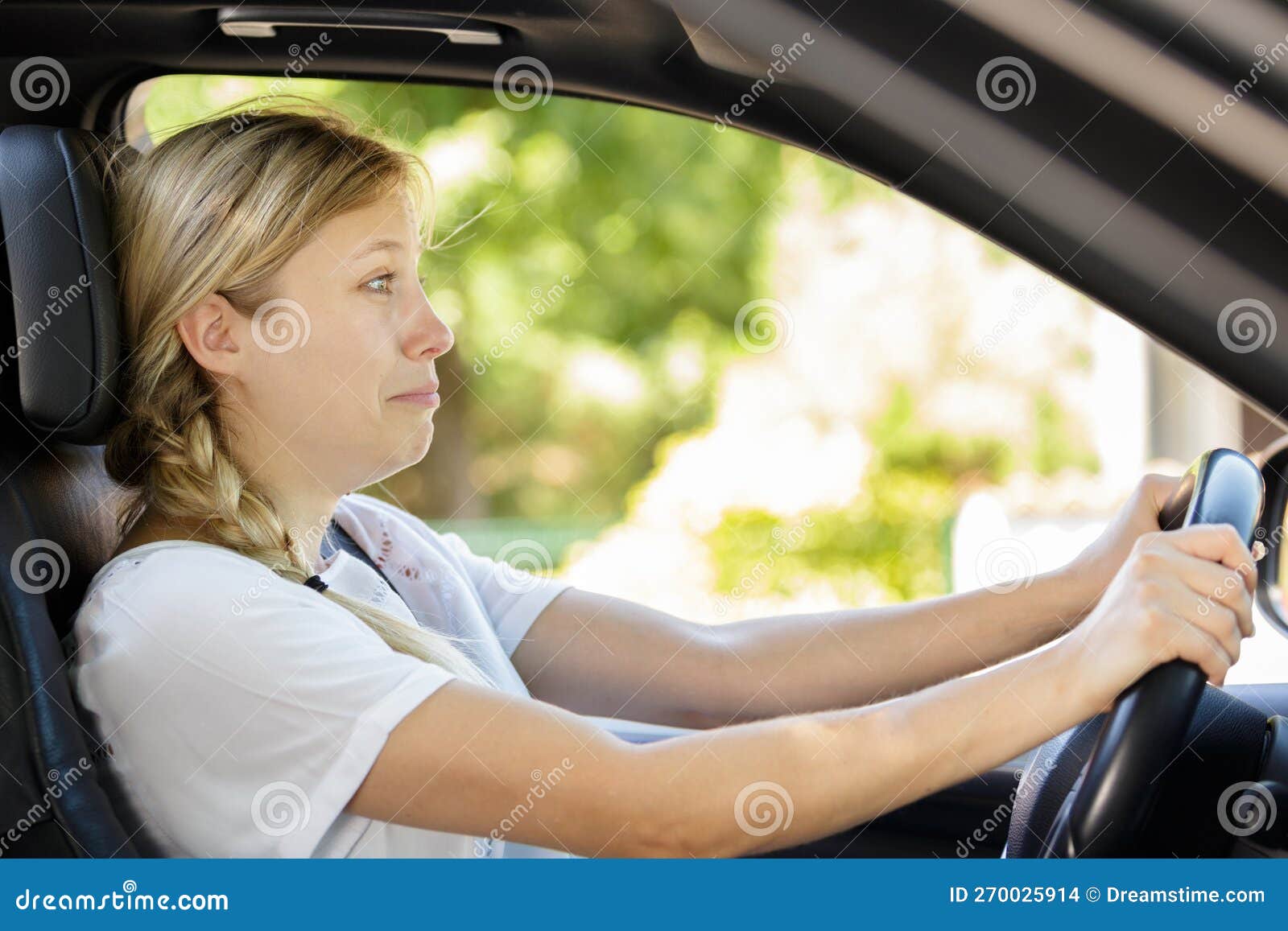 Scared woman inside car stock photo. Image of brunette - 270025914