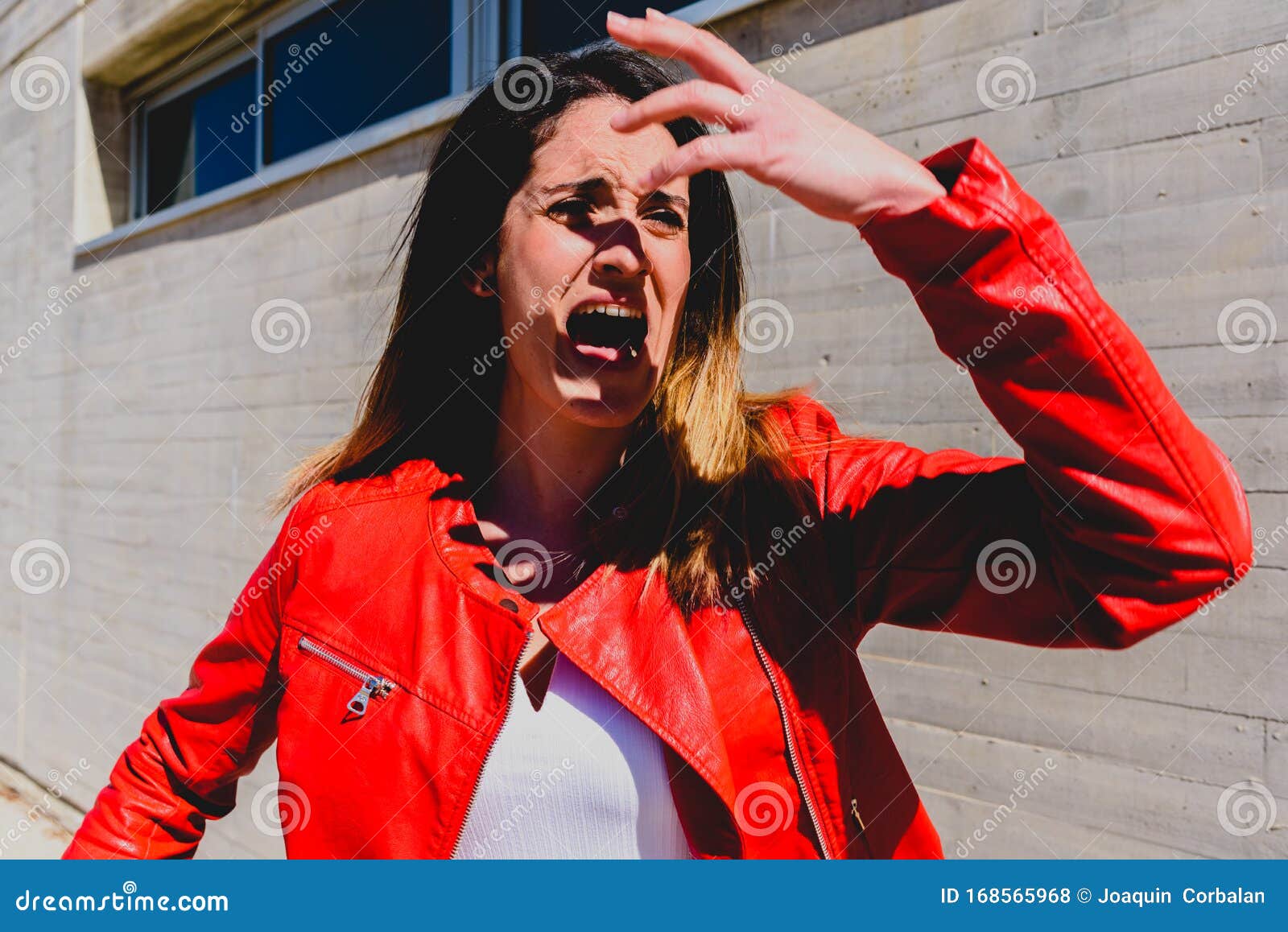 Scared Woman is Scared and Makes a Panic Face while Screaming for Help ...