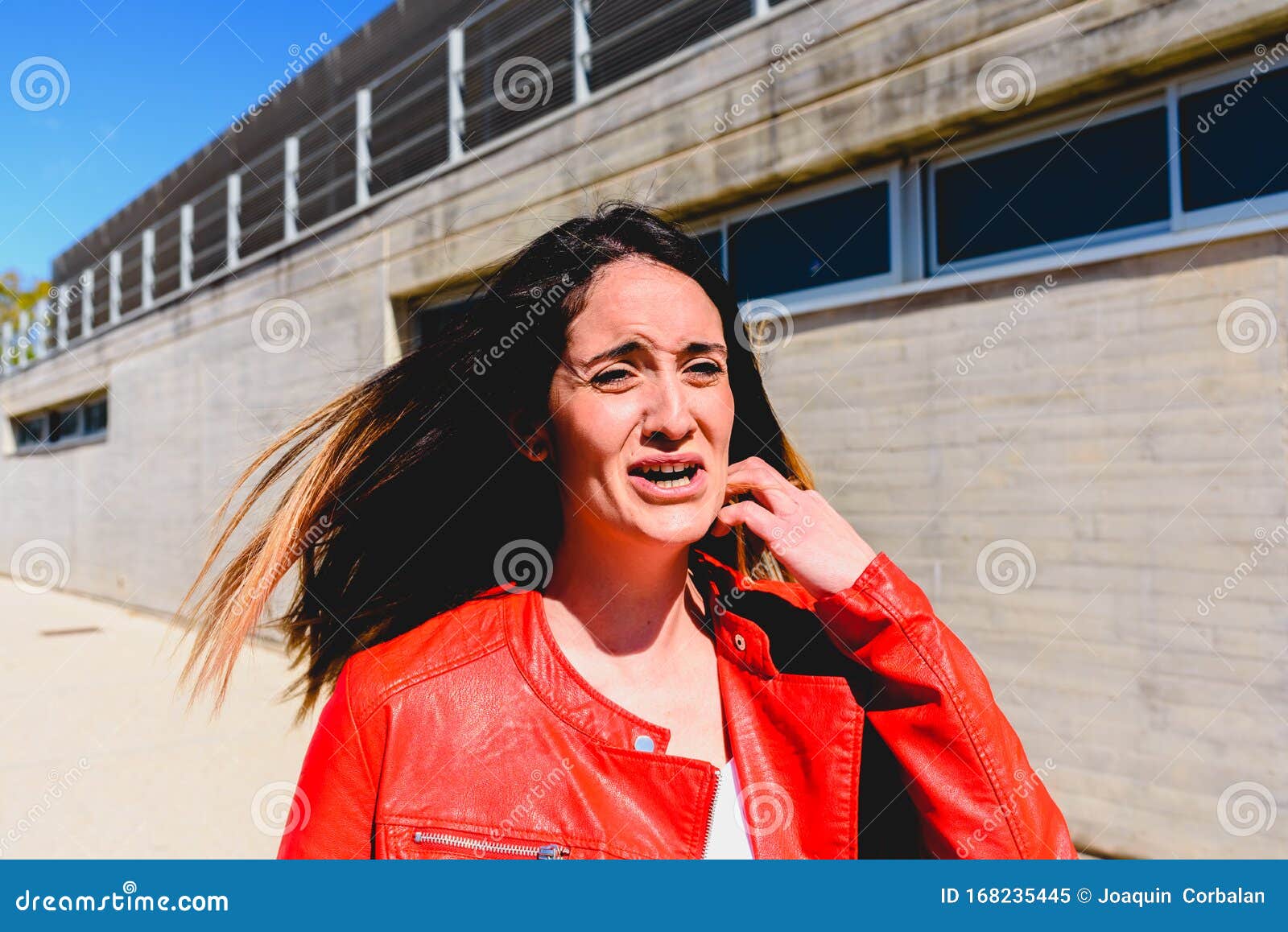 Scared Woman is Scared and Makes a Panic Face while Screaming for Help ...