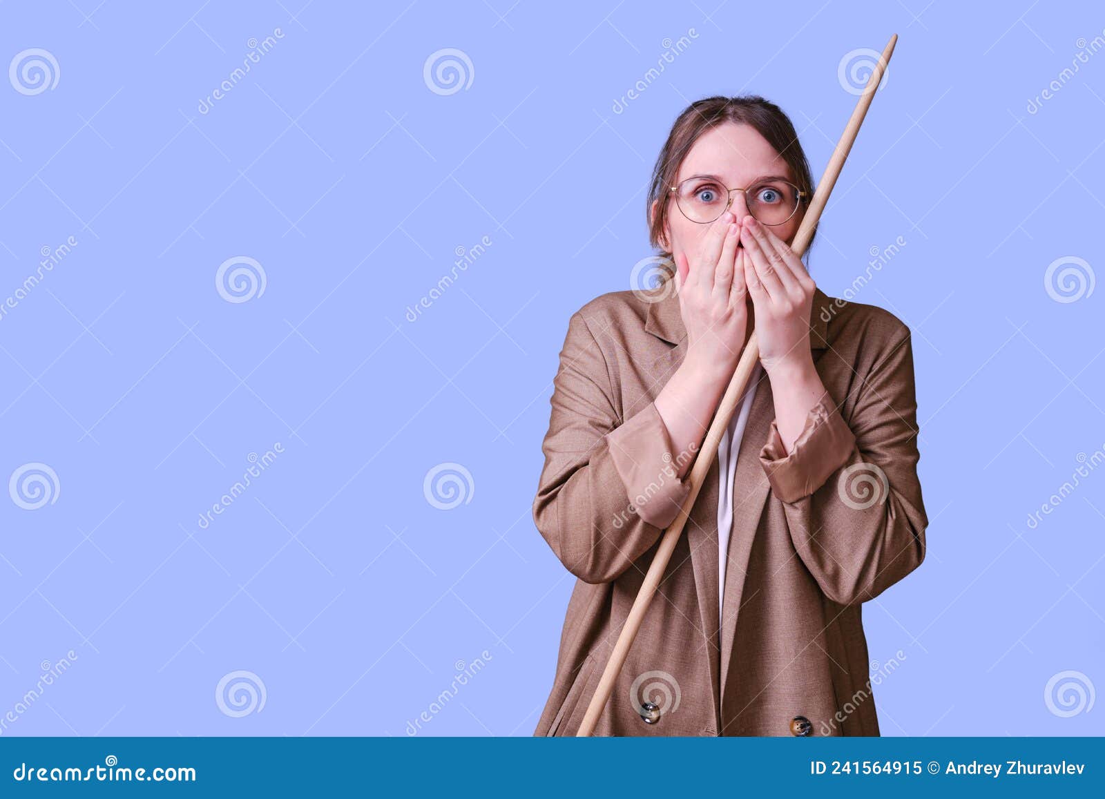 Scared Woman Teacher with Pointer on Studio Blue Background, Copy Space ...