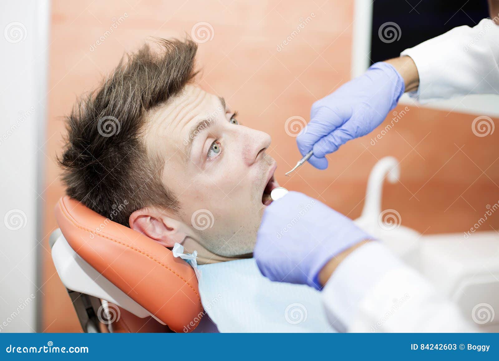 Scared Young Man at Dentist Office Stock Image - Image of fear, people ...