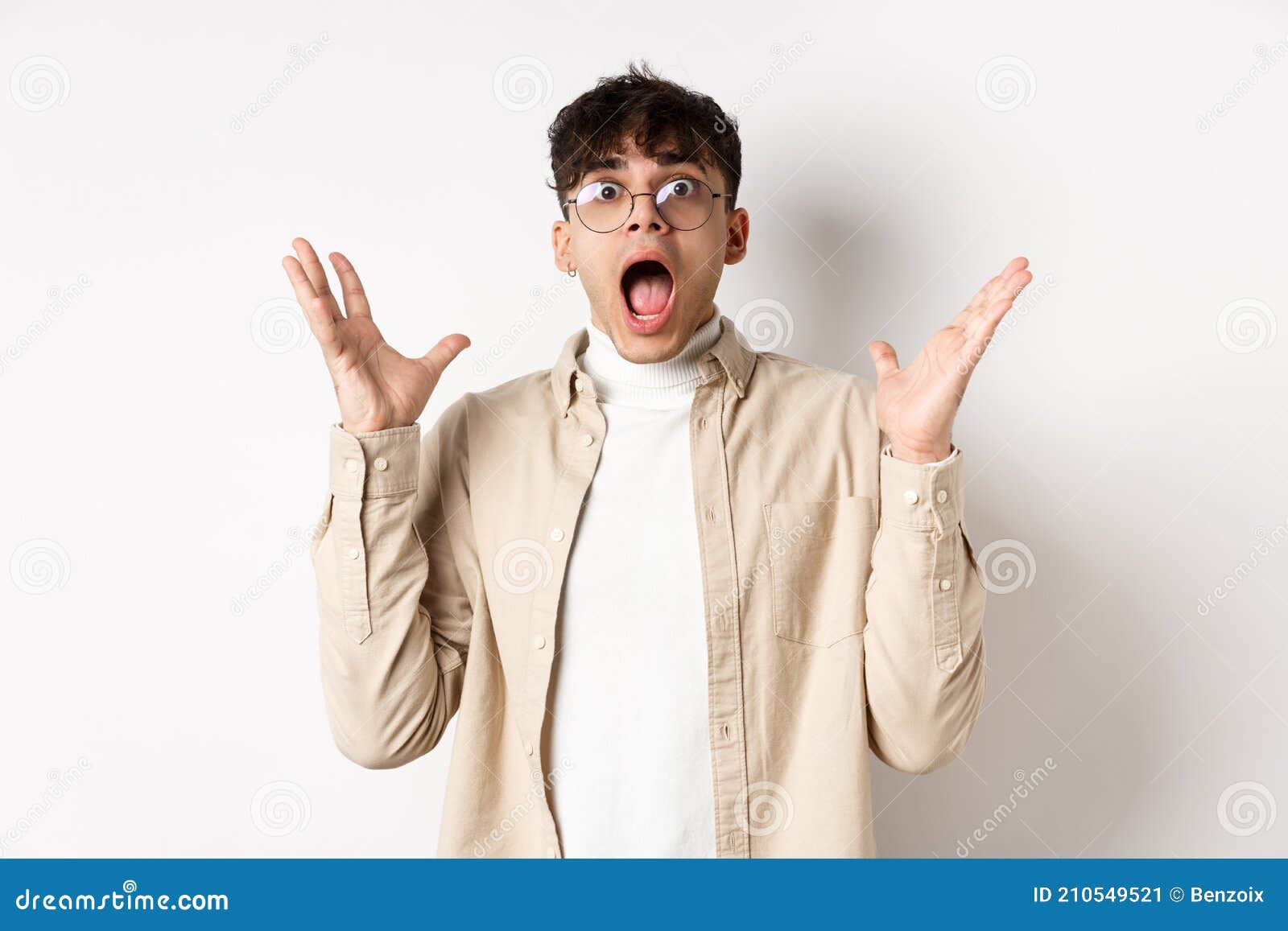 Scared Young Man in Panic, Screaming and Looking Axious, Jumping ...