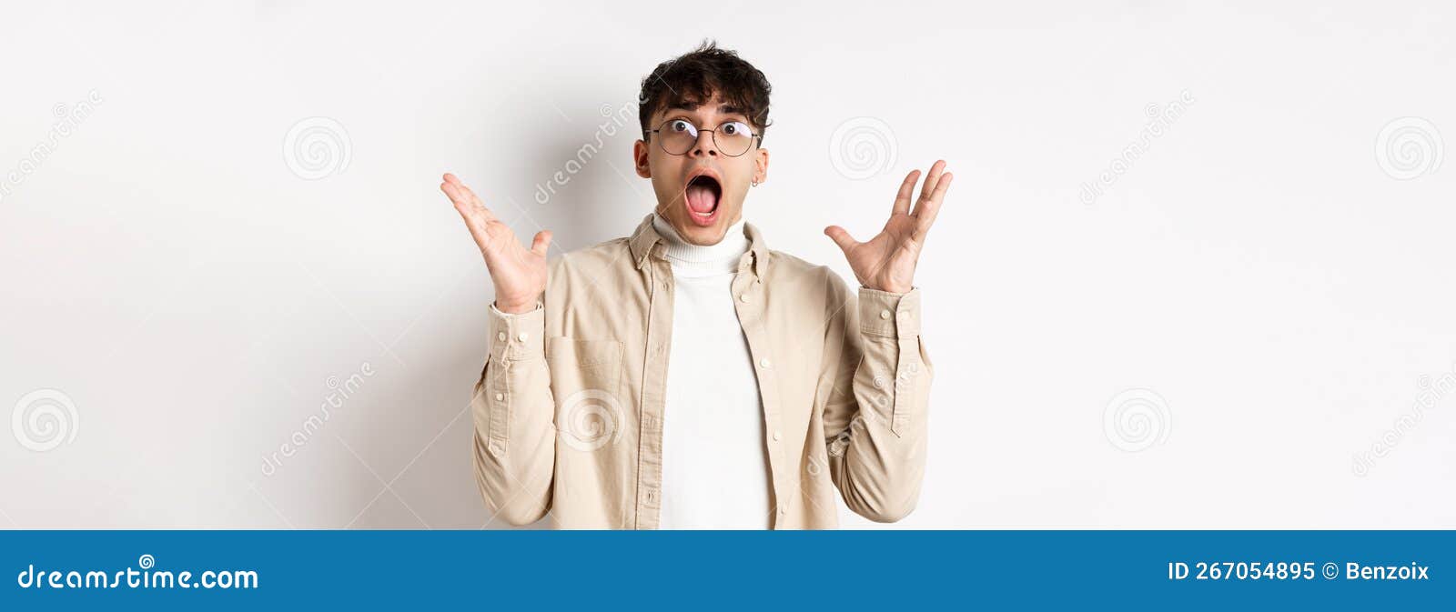 Scared Young Man in Panic, Screaming and Looking Axious, Jumping ...