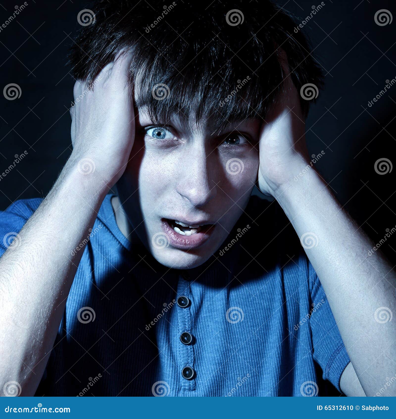 Scared Young Man stock photo. Image of fearful, fear - 65312610