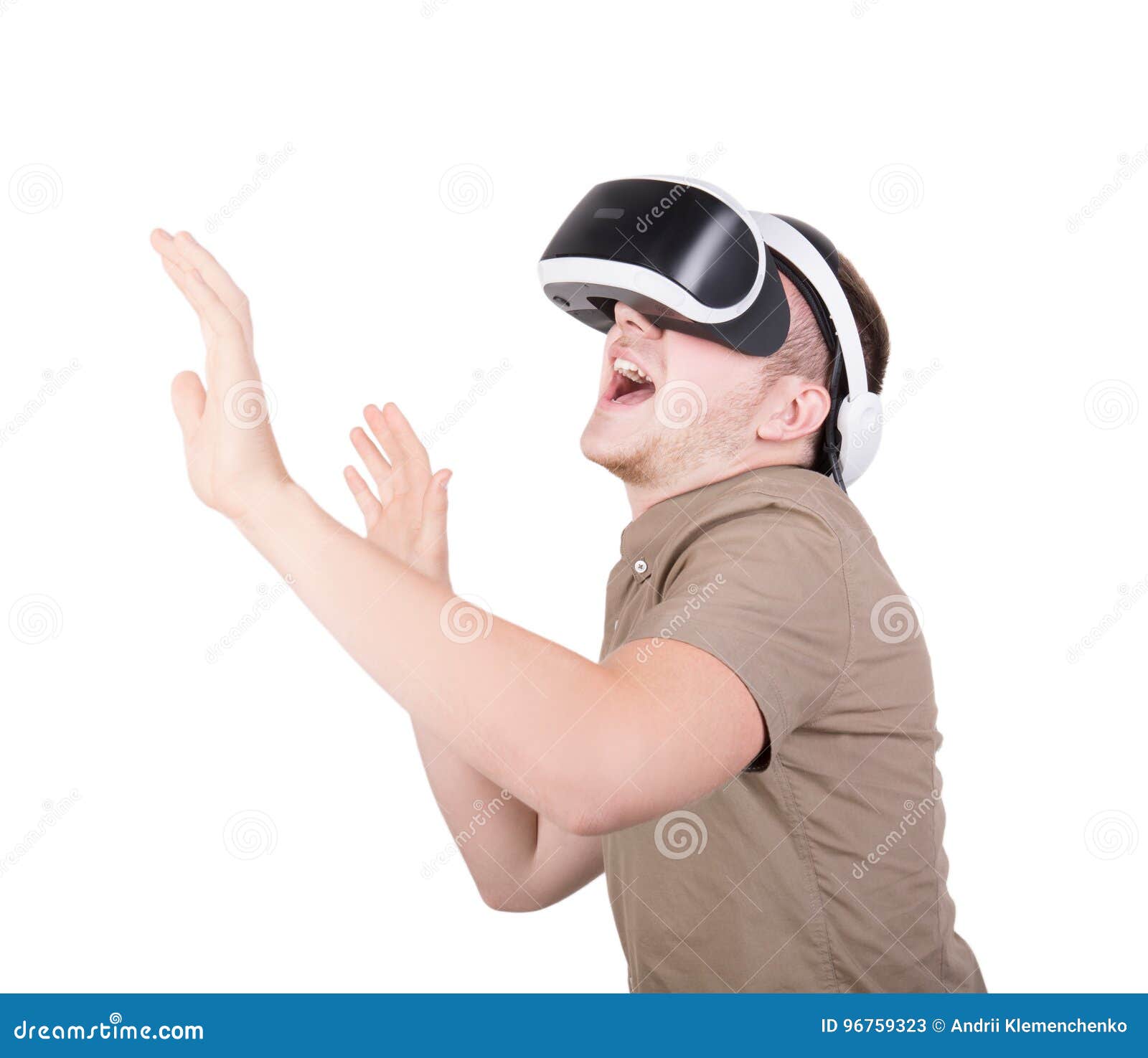 Scared Young Man Wearing Virtual Reality Goggles and Playing Virtual ...