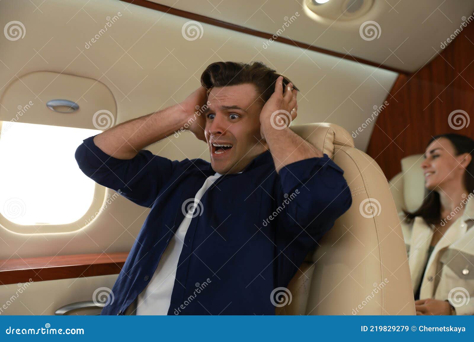 Scared Young Man Suffering from Aviophobia in Airplane Stock Image ...