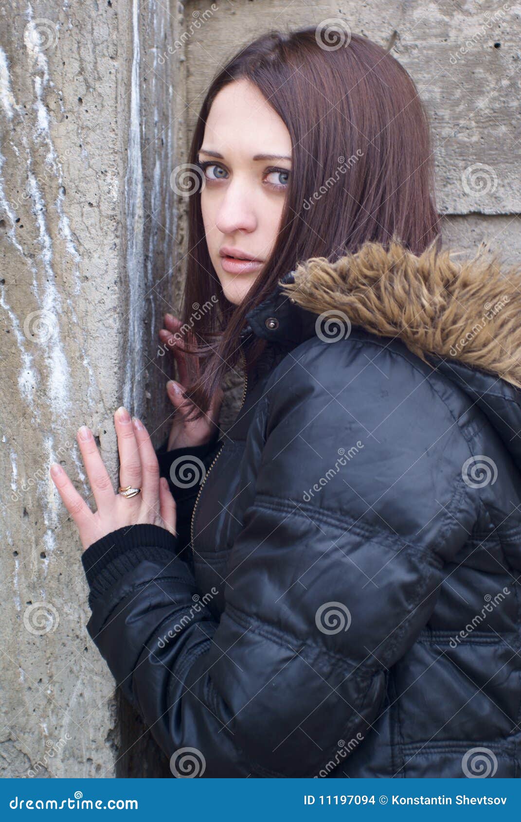 Scared Young Woman Isolated On Red Studio Background Peep Through ...
