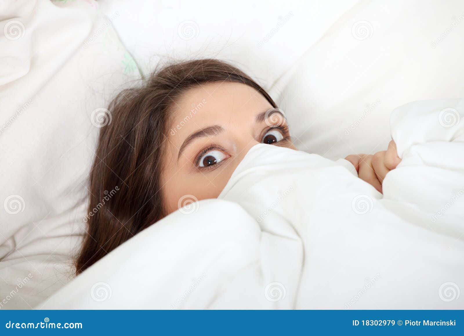Scared Young Woman Isolated On Red Studio Background Peep Through ...