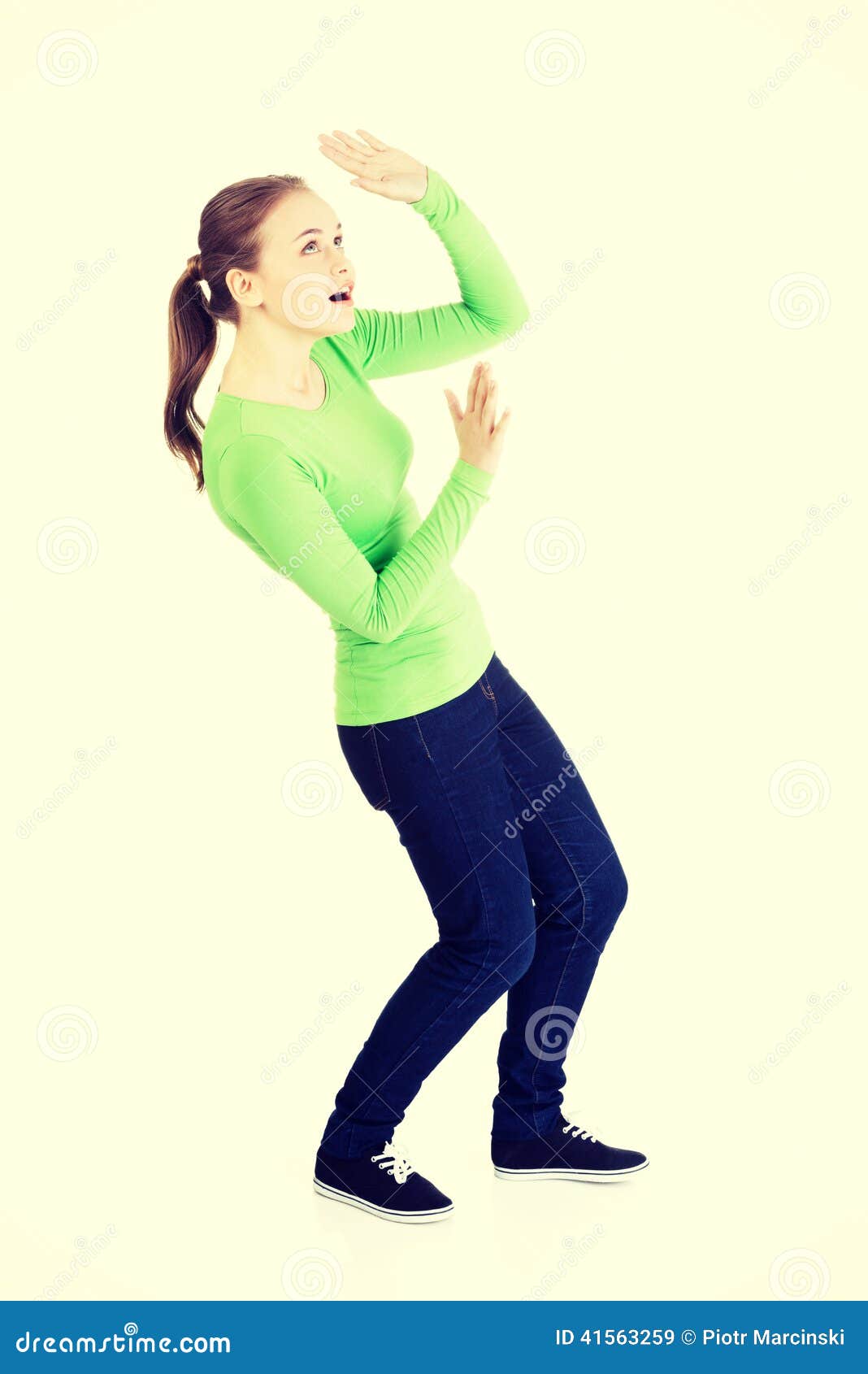 Scared Young Woman Afraid of Something Above Her Stock Image - Image of ...