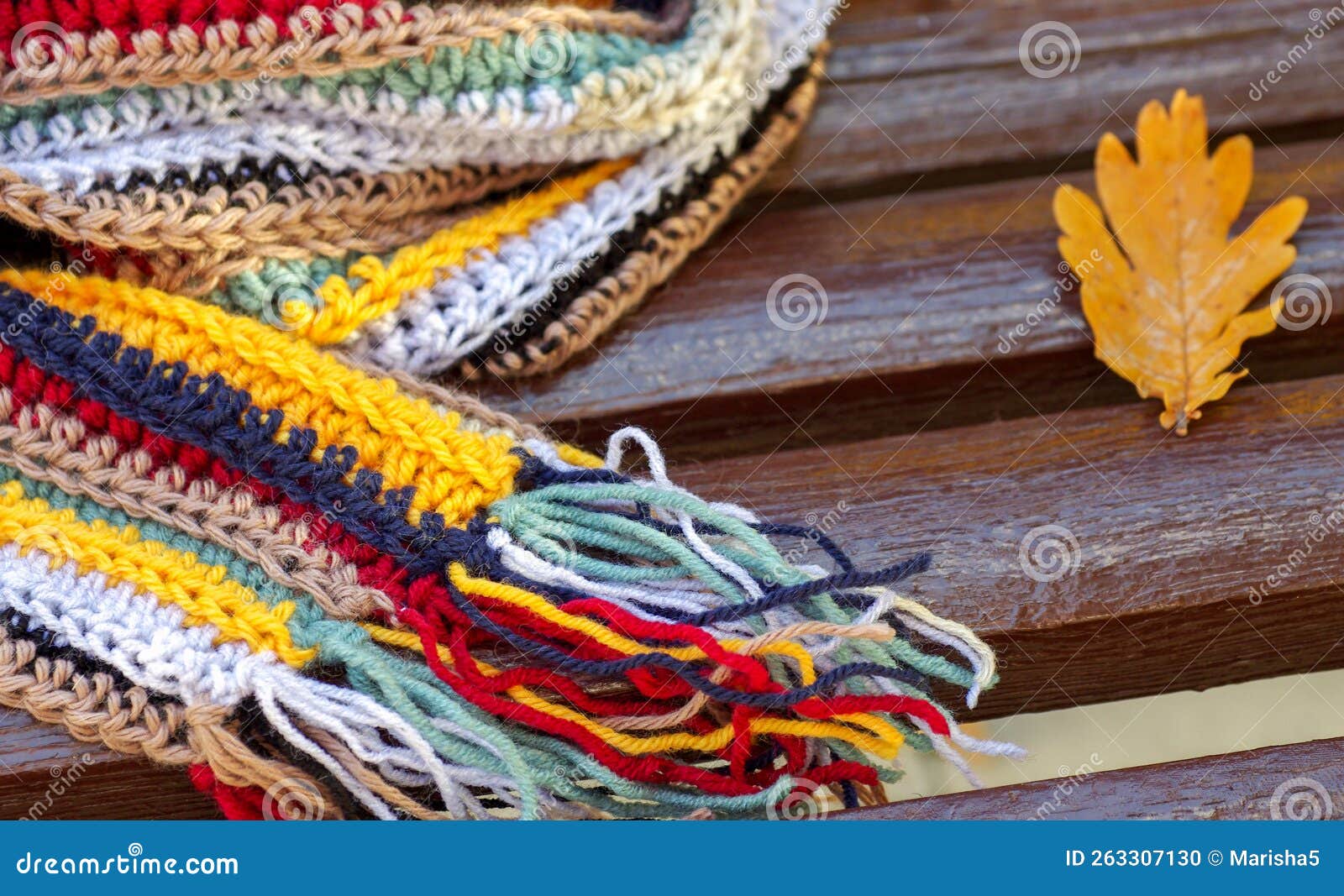 Scarf on a bench stock photo. Image of outdoor, orange - 263307130