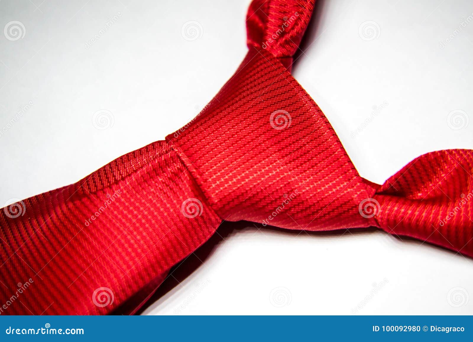 Scarlet red tie with knot stock photo. Image of wavy - 100092980