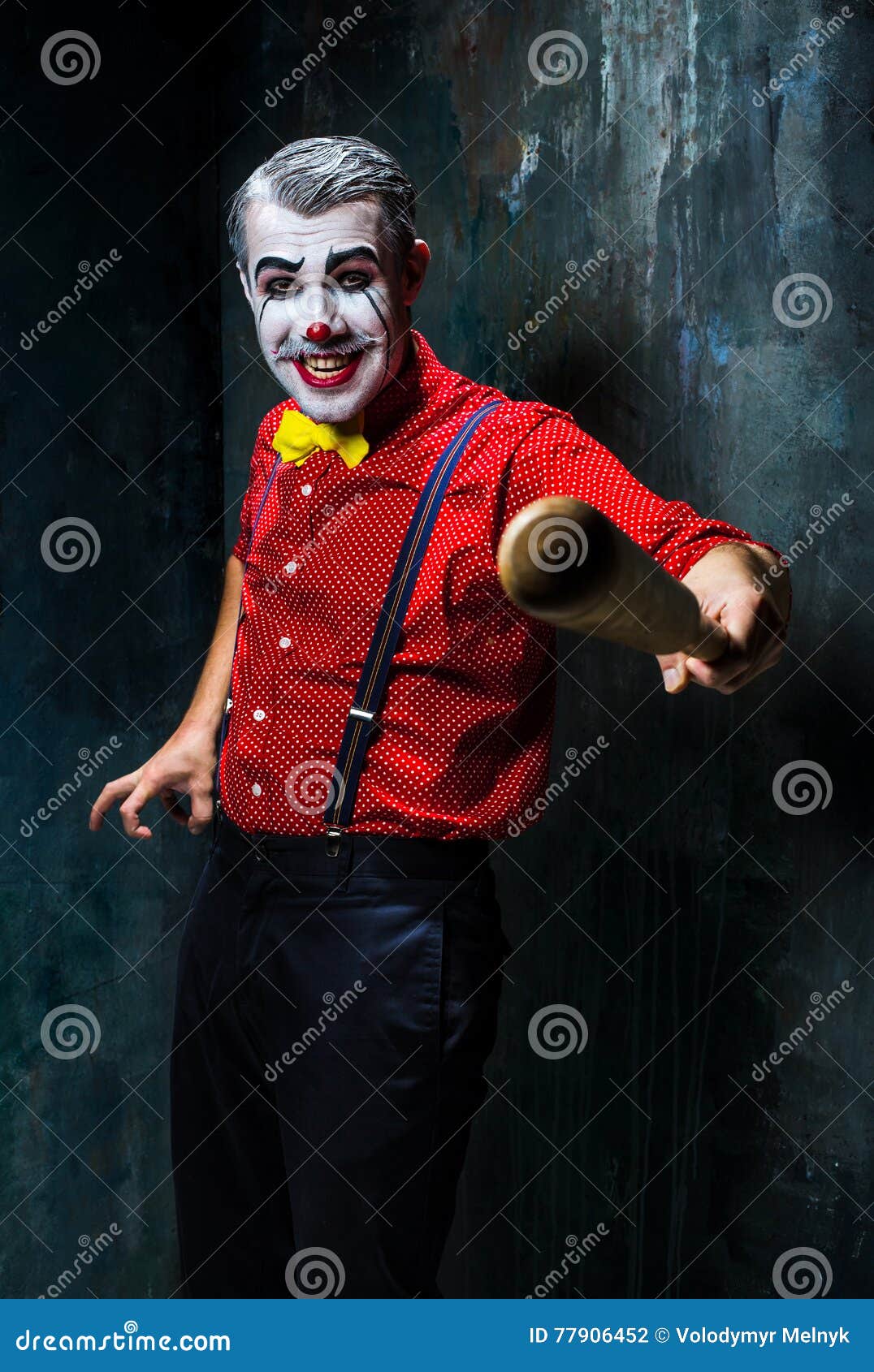 The Scary Clown and Baseball-bat on Dack Background. Halloween Concept ...