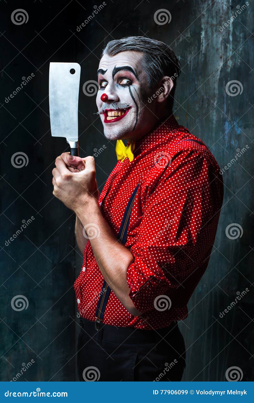 The Scary Clown Holding a Knife on Dack. Halloween Concept Stock Image ...