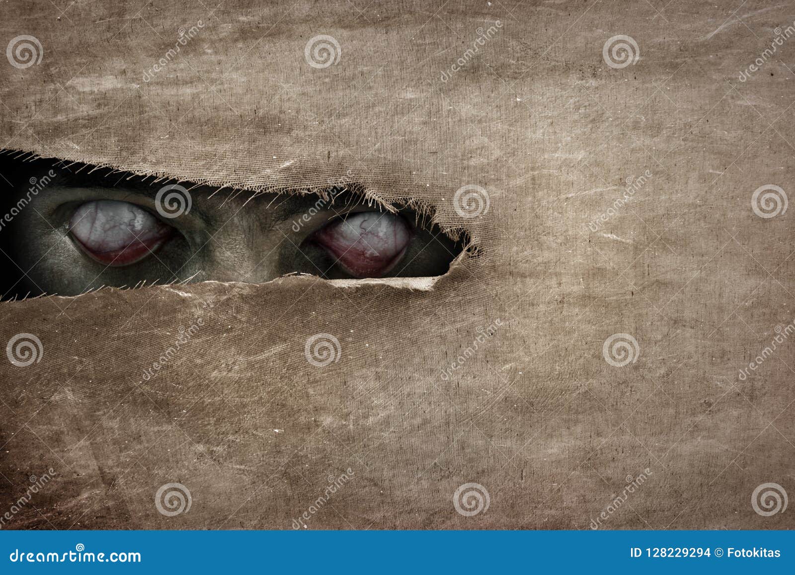 Scary devil eyes peeking stock photo. Image of ghost - 128229294