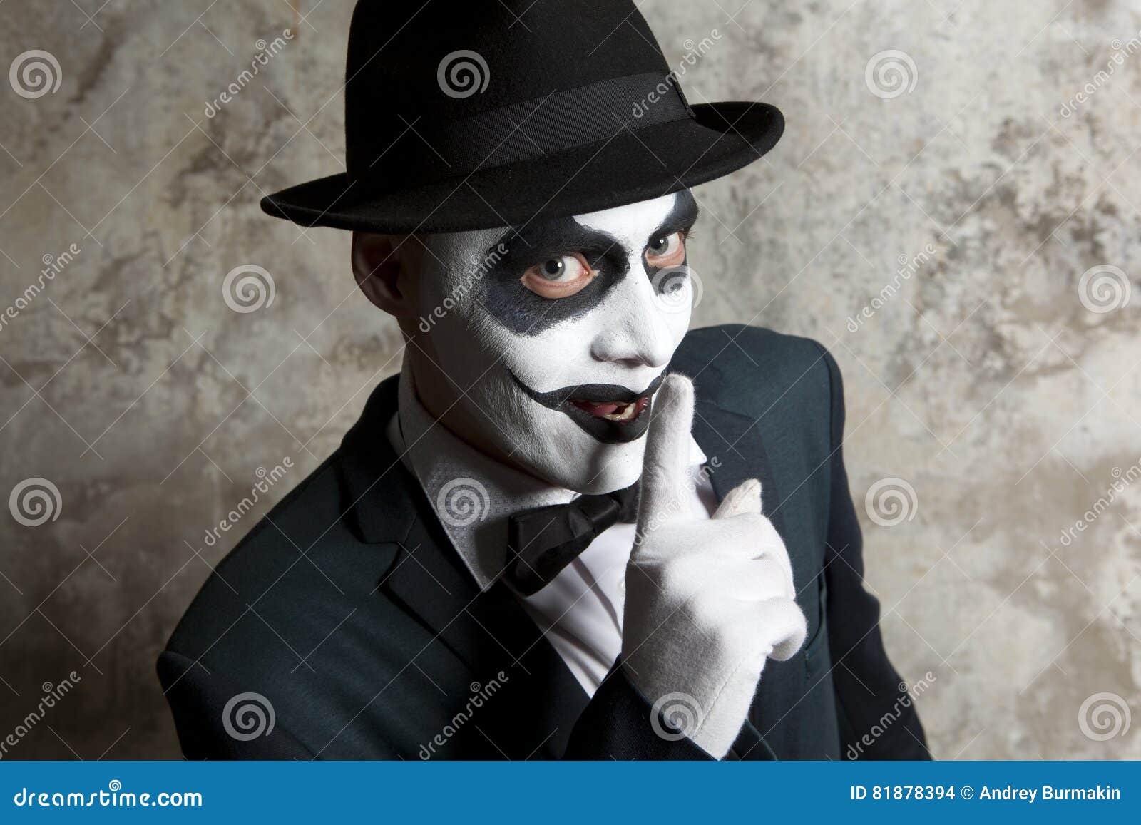 Scary Evil Clown Wearing a Bowler Hat on Wall Stock Photo - Image of ...