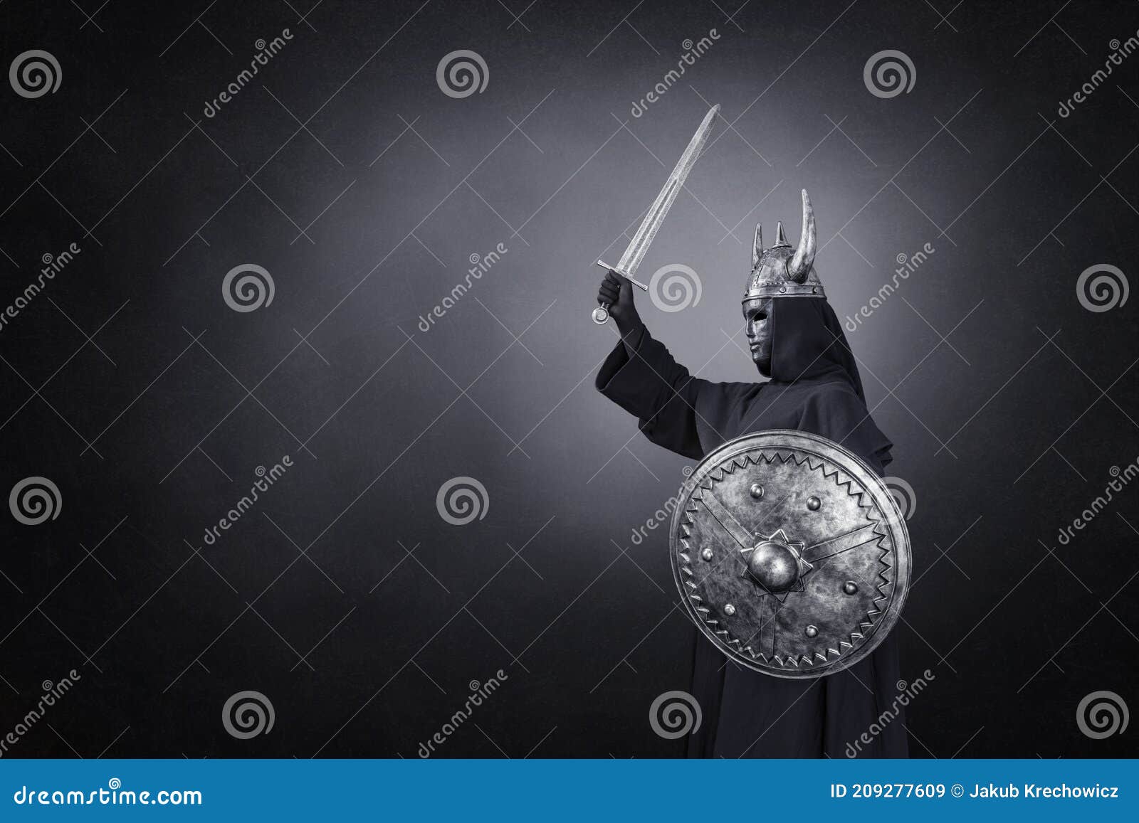 Scary Figure with Horned Helmet, Sword and Round Shield Stock Image ...