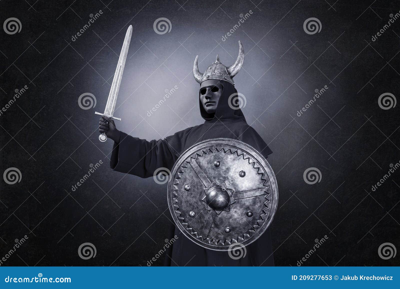 Scary Figure with Horned Helmet, Sword and Round Shield Stock Image ...