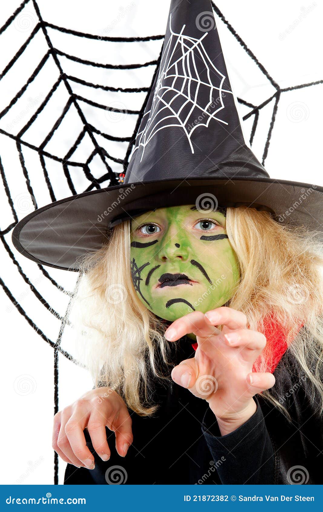 The Scary Green Face Witch With Black Outfit And Pointed Hat In Front ...
