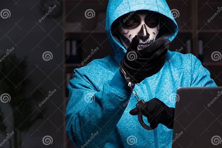 The Scary Hacker Hacking Security Firewall Late in Office Stock Photo ...