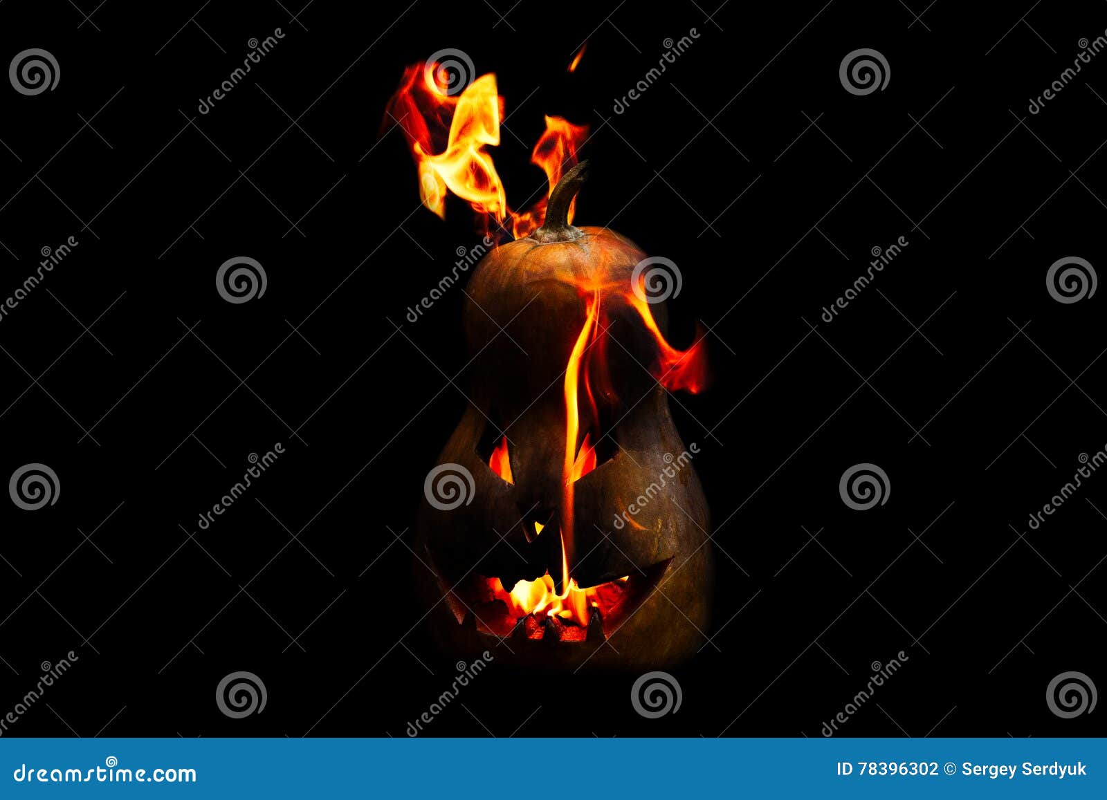 Scary Halloween Pumpkin is Spewing Fire Flame Isolated on Black Stock ...