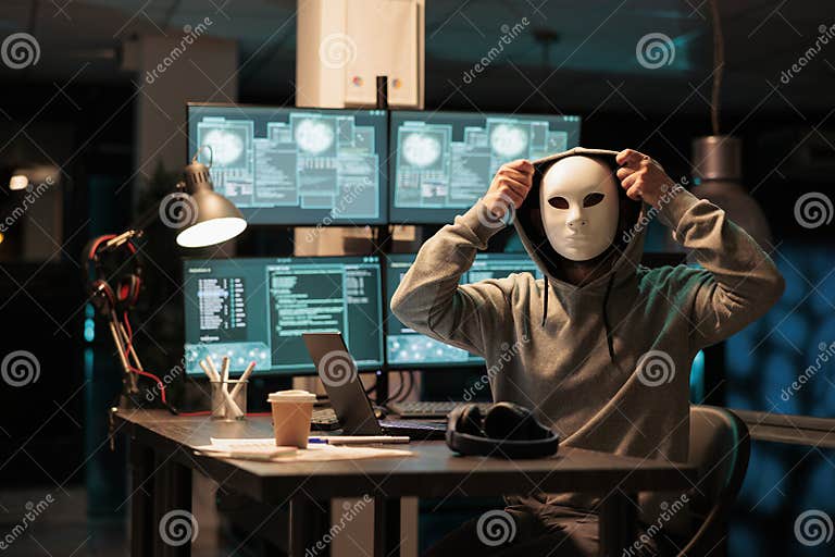 Scary Masked Hacker Installing Virus To Hack System Stock Photo - Image ...