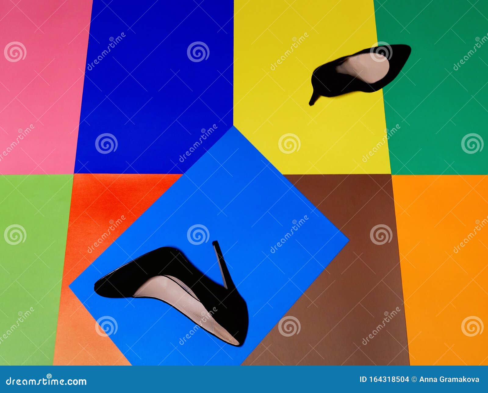 Scattered Black Shoes on Colorful Surface Stock Photo - Image of focus ...