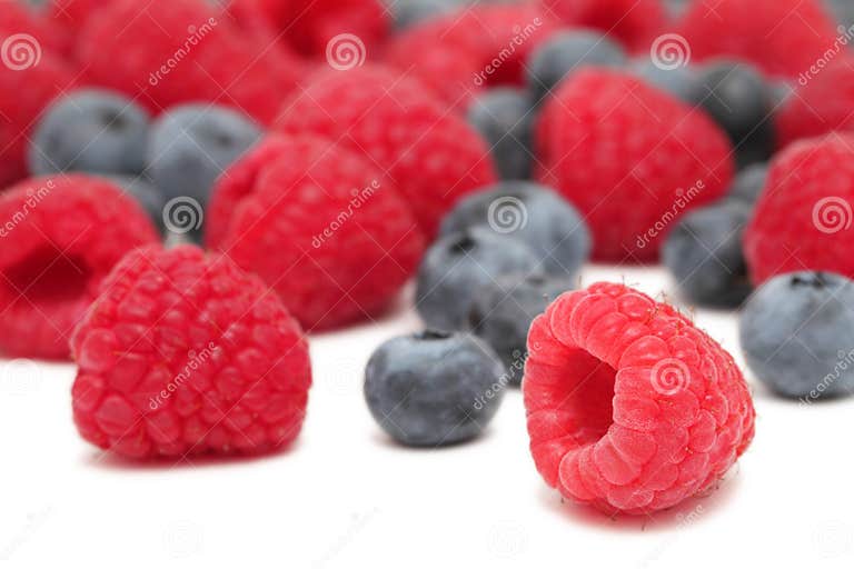 Scattered Blueberry and Raspberry on White Background Stock Image ...