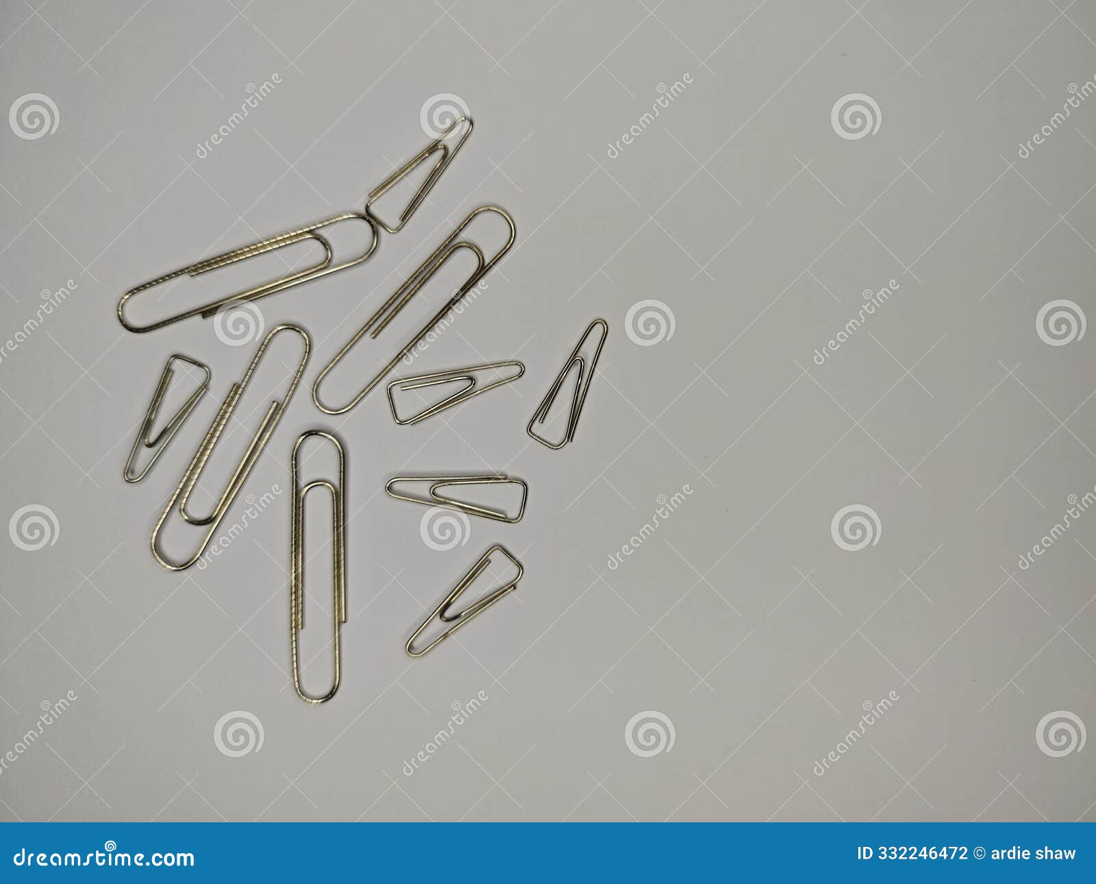 A Scattered Cluster of Paper Clips, Showcasing Their Various Shapes and ...