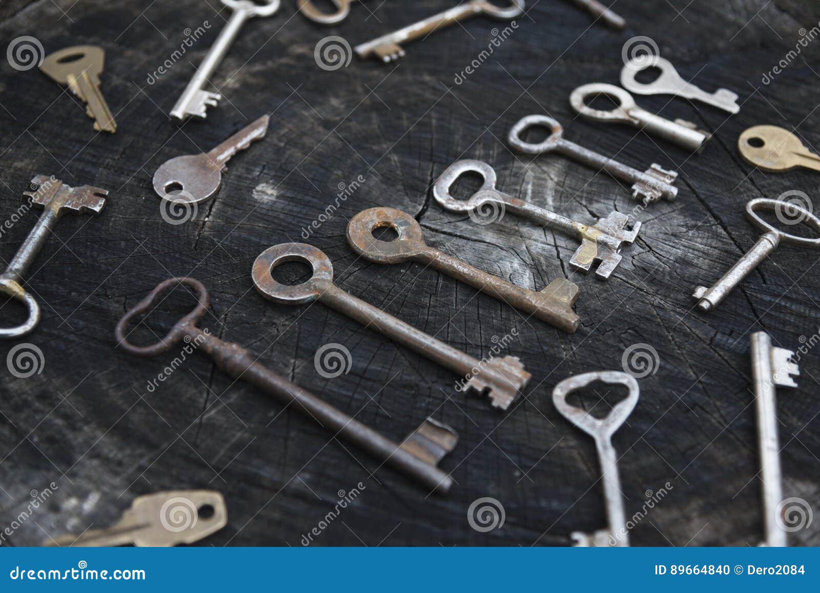 Scattered Collection of Old Keys on a Wooden Surface Stock Photo ...