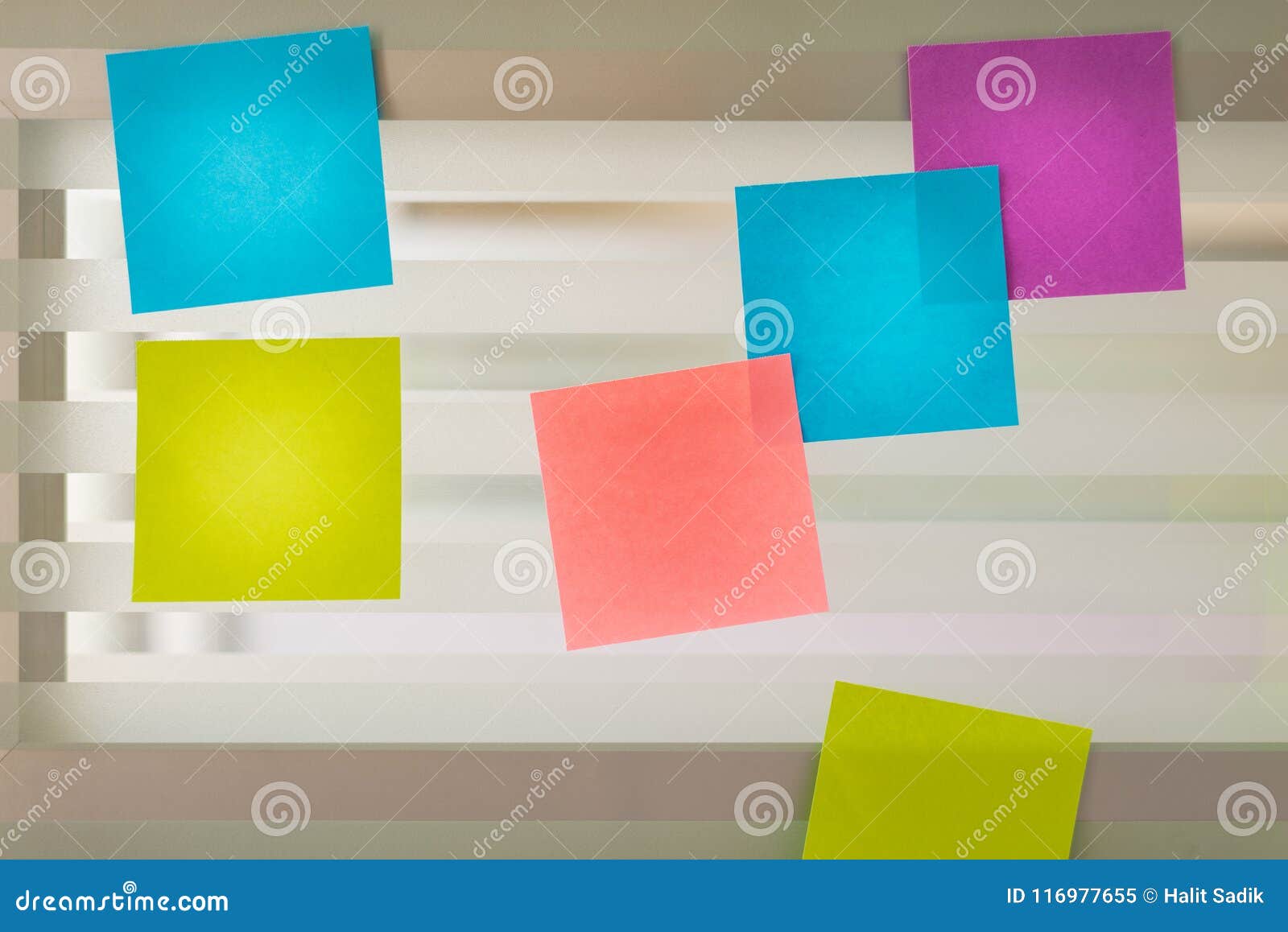Scattered Colored Sticky Notes Over Glass Screen of a Bench Desk Stock ...