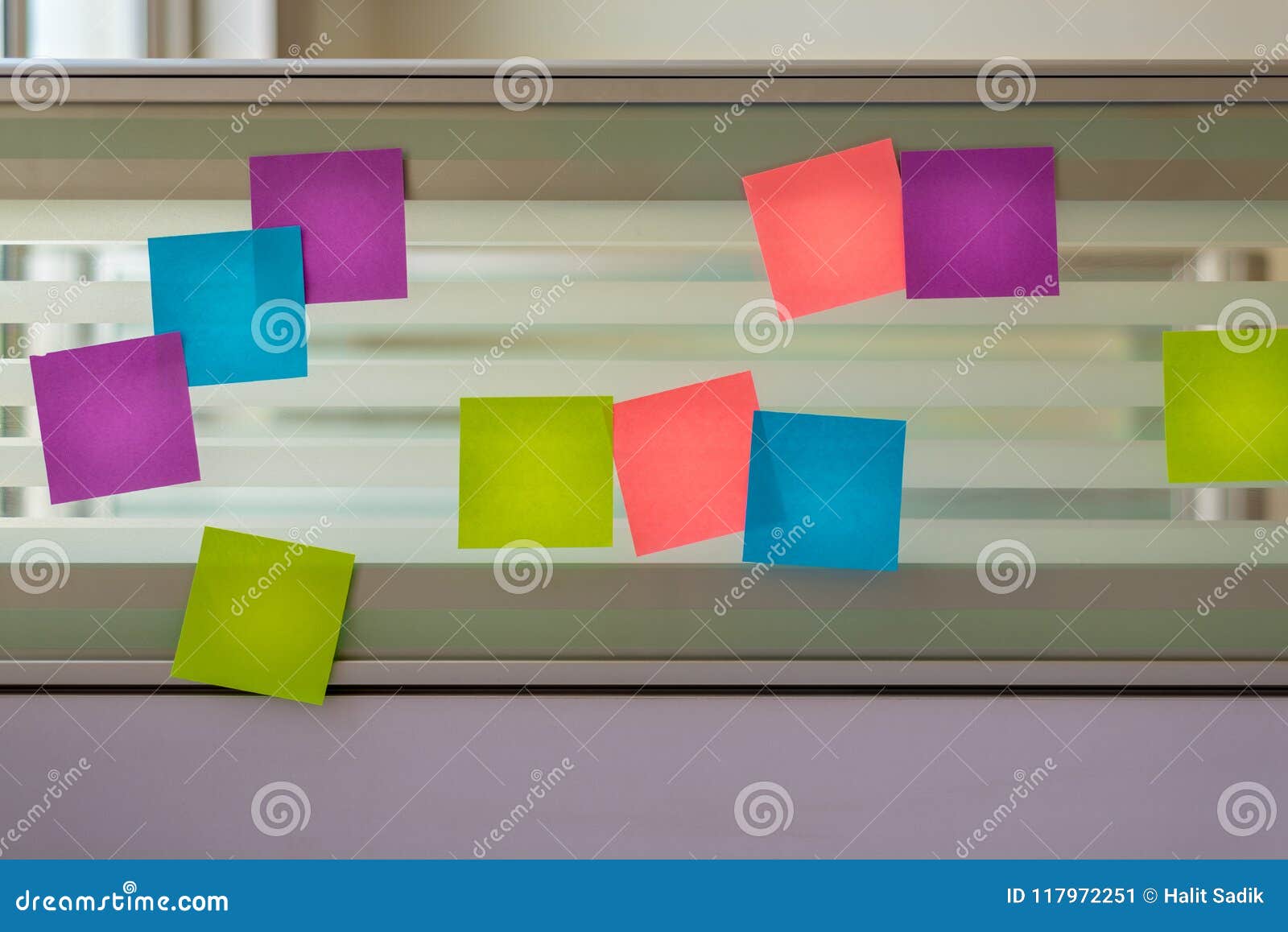 Scattered Colored Sticky Notes Over Glass Screen of a Bench Desk Stock ...
