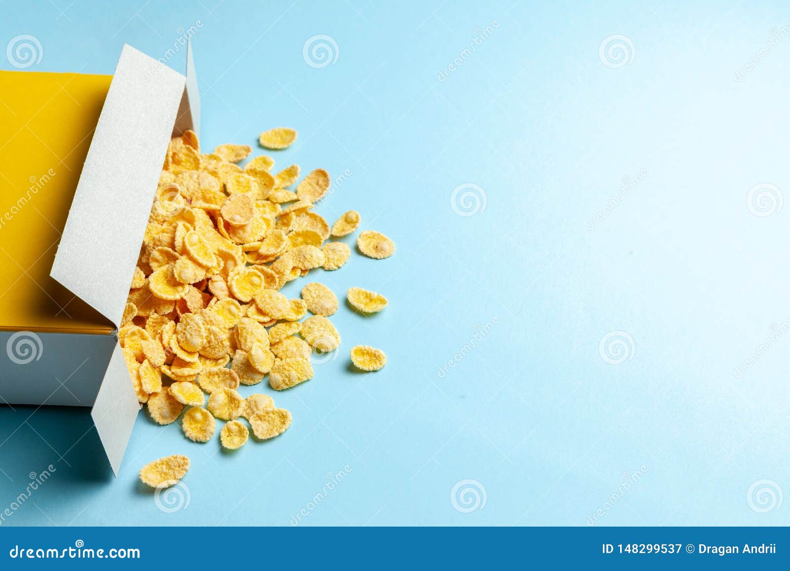 Scattered Cornflakes Out of the Box. Dry Cereal Breakfast. Copy Space ...