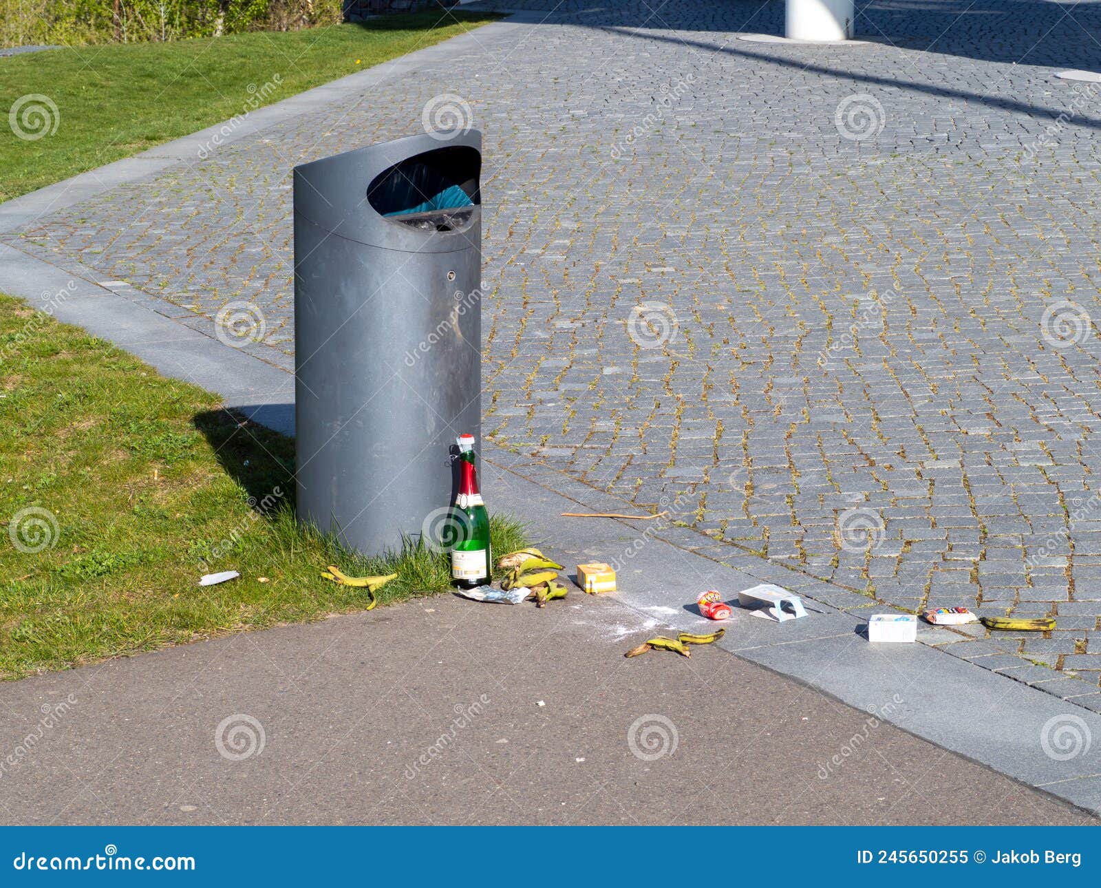 Scattered Garbage Around the Trash Can in the Park. Stock Image - Image ... Scattered Garbage Around the Trash Can in the Park. Stock Image - Image ...