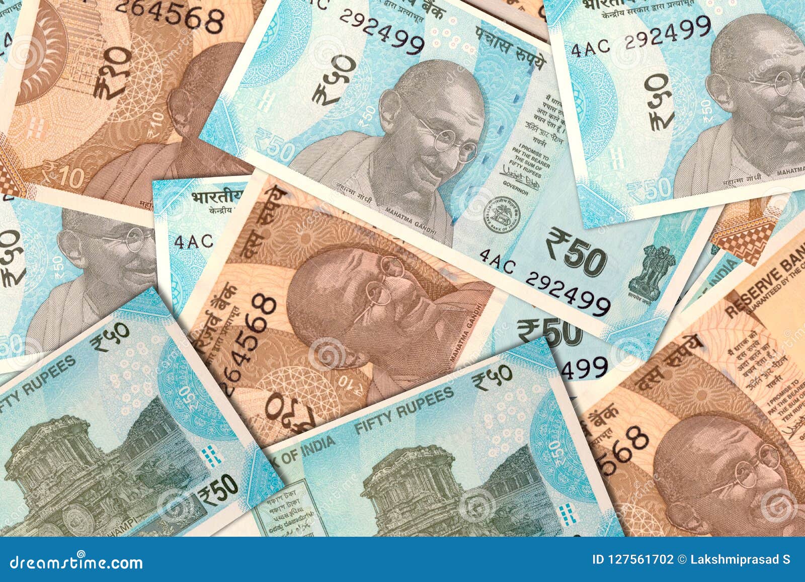 Scattered Indian New 10 and 50 Rupee Currency Notes. Stock Photo ...