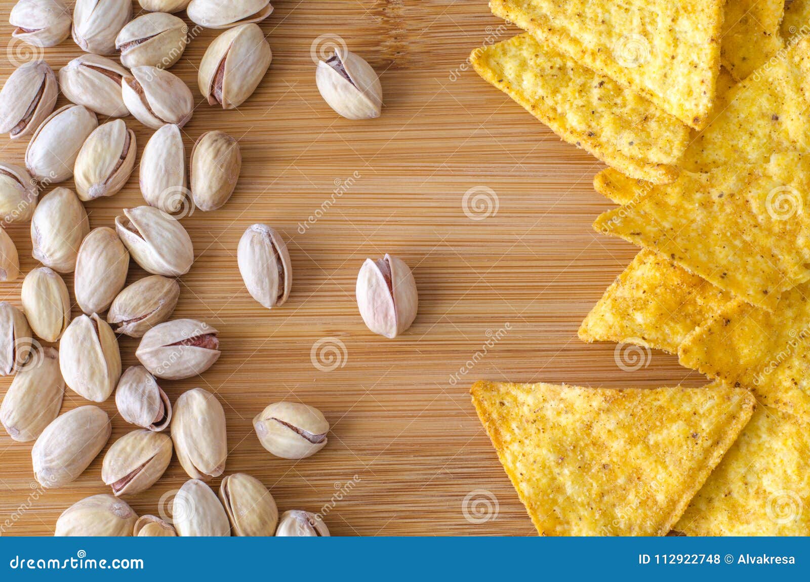 Scattered Nachos and Pistachios Nuts Stock Photo - Image of pepper ...