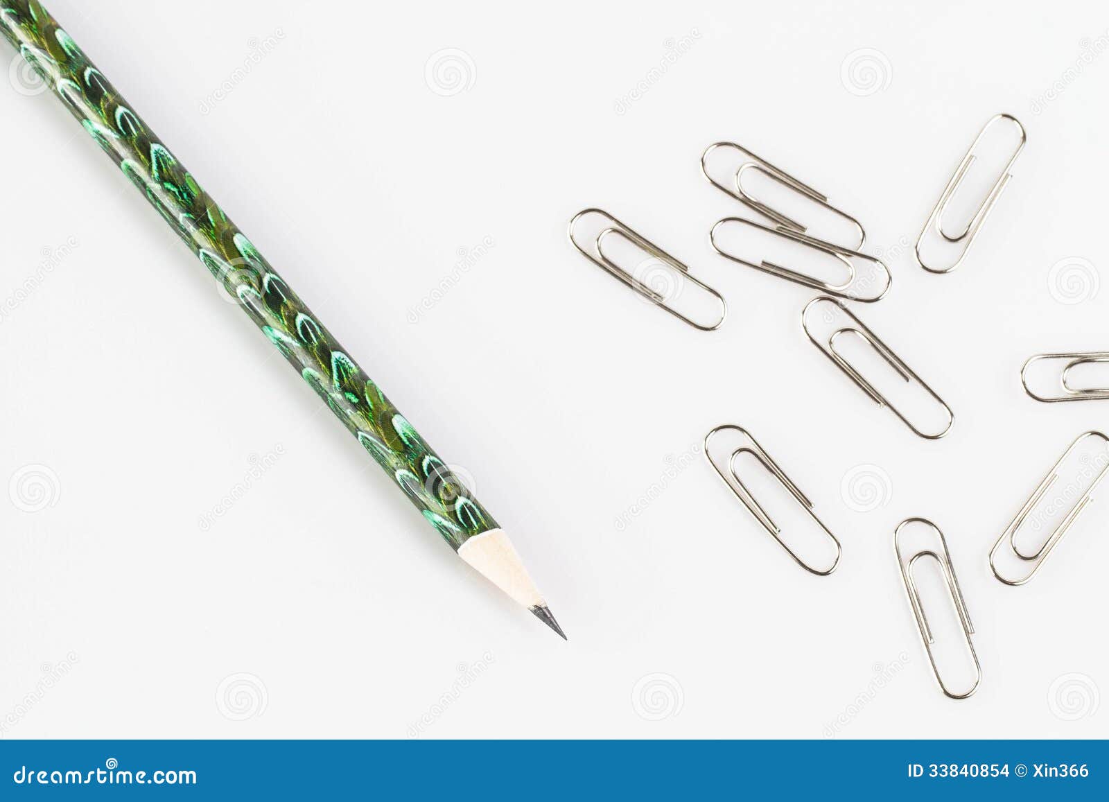 Scattered Paper Clips and a Pencil Stock Photo - Image of education ...