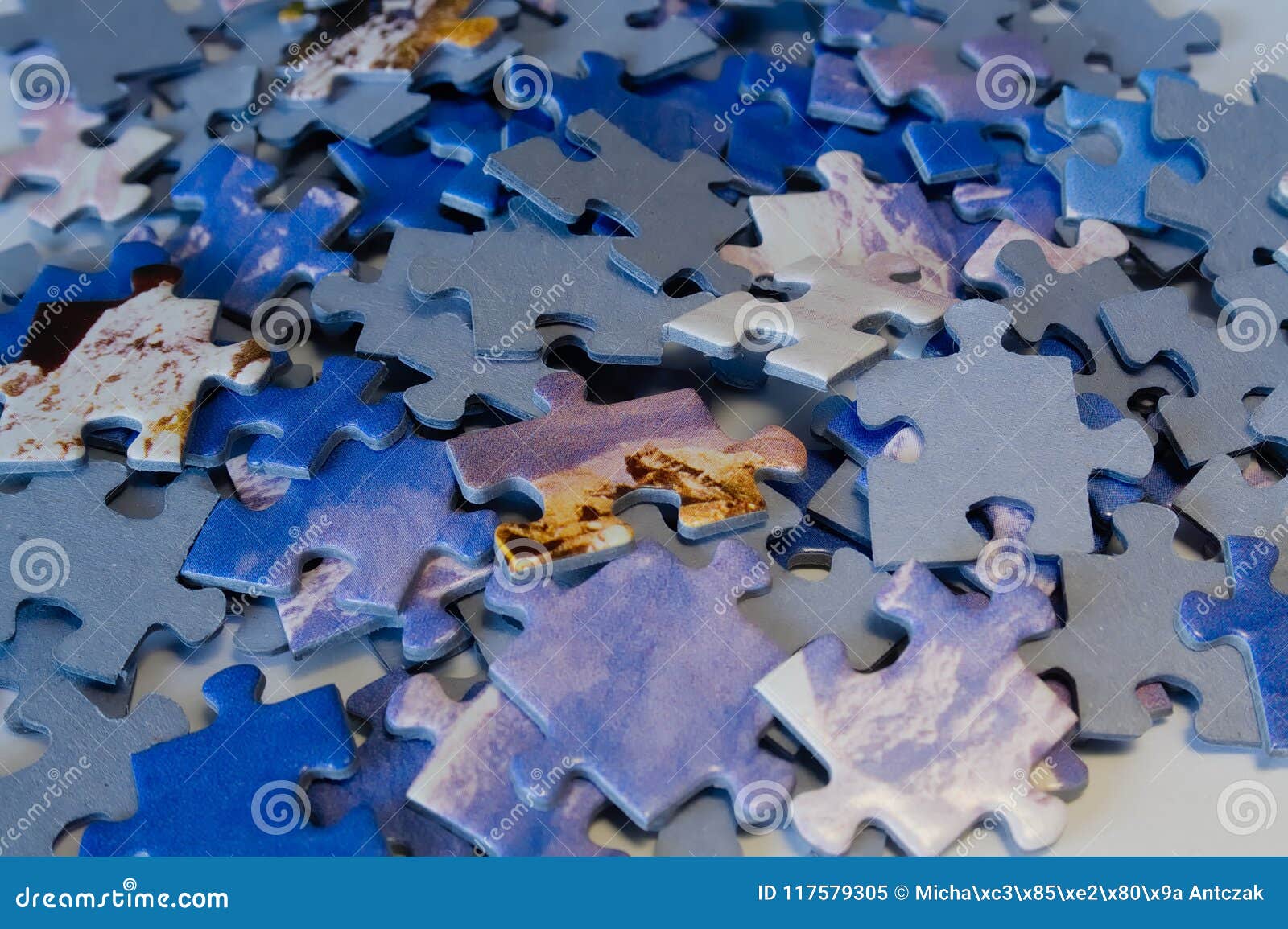 Scattered Puzzle Pieces with Blue Motive Stock Image - Image of jigsaw ...