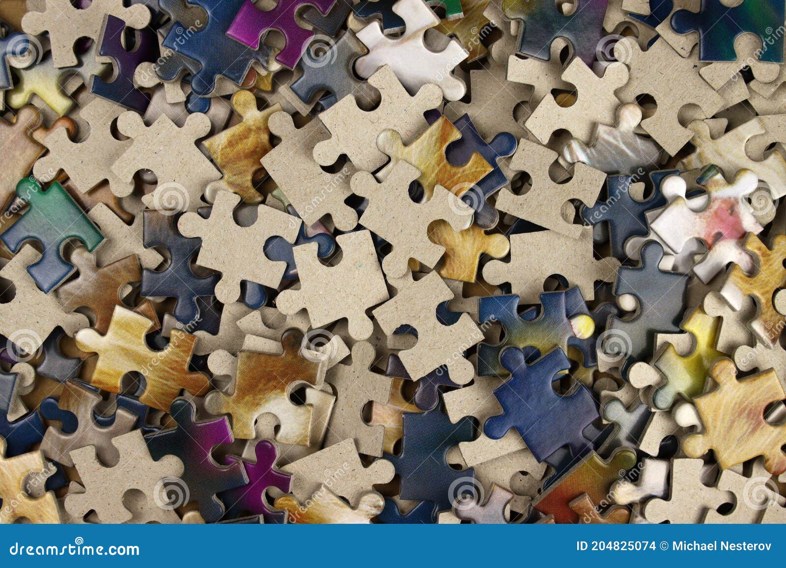 Scattered Puzzle Pieces in a Box, Background, Texture Stock Photo ...