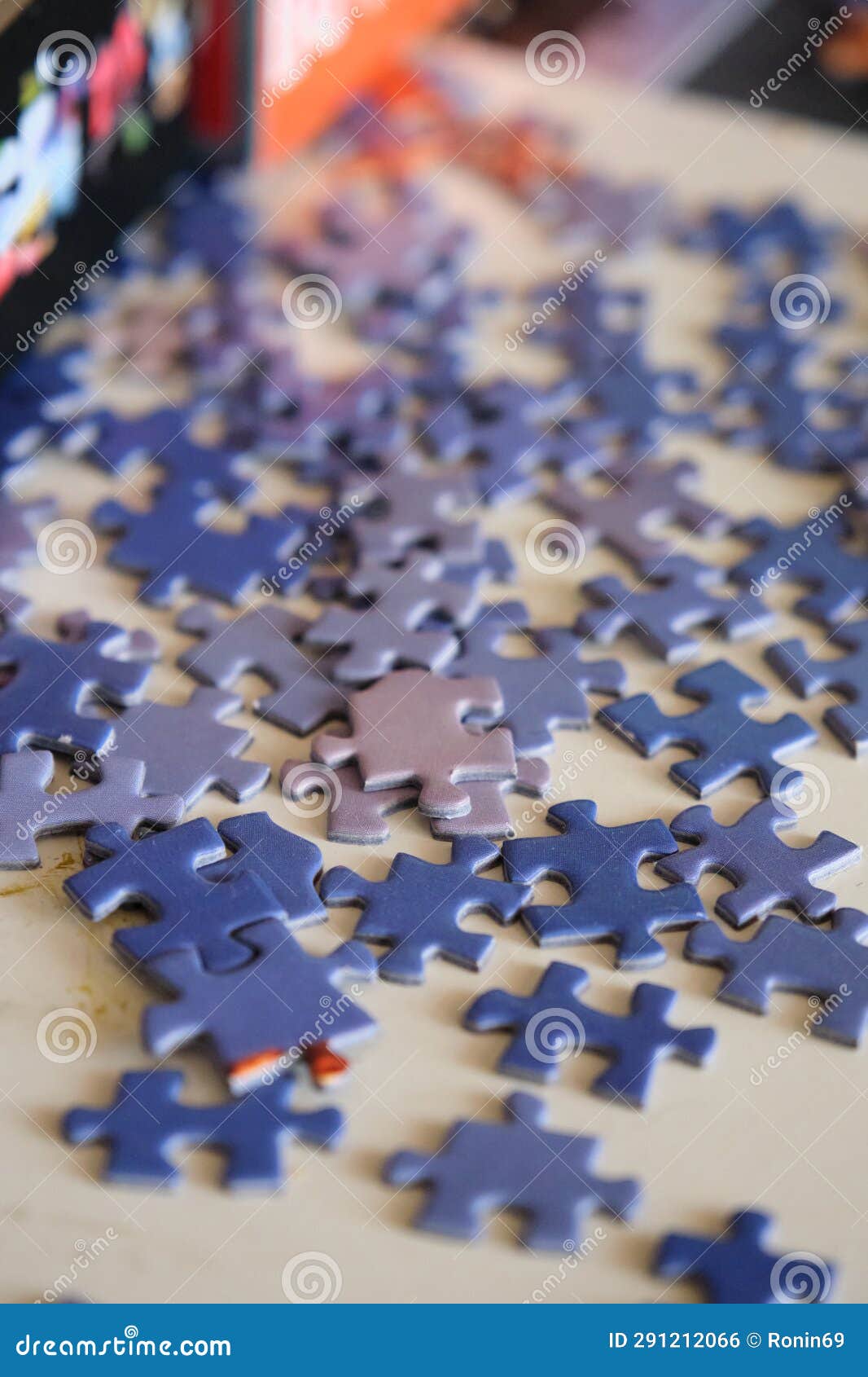 Scattered Puzzle Pieces on the Table Stock Photo - Image of colorful ...